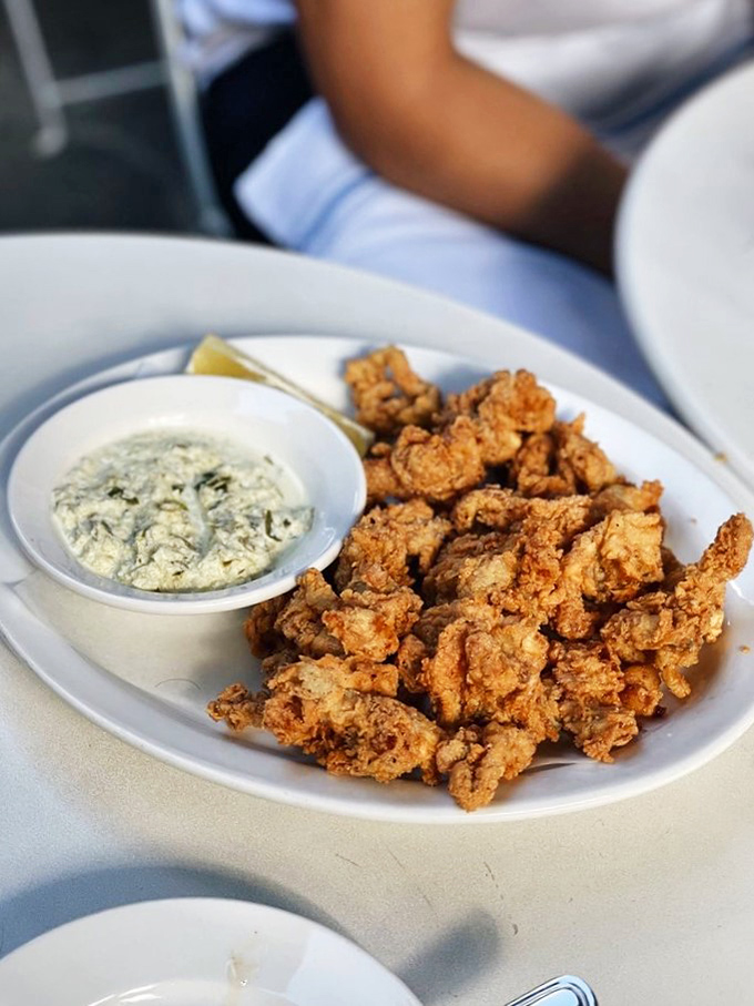 Fried clam nirvana: Golden, crispy morsels that crunch like nature's potato chips. Dip them in tartar sauce for maximum happiness.