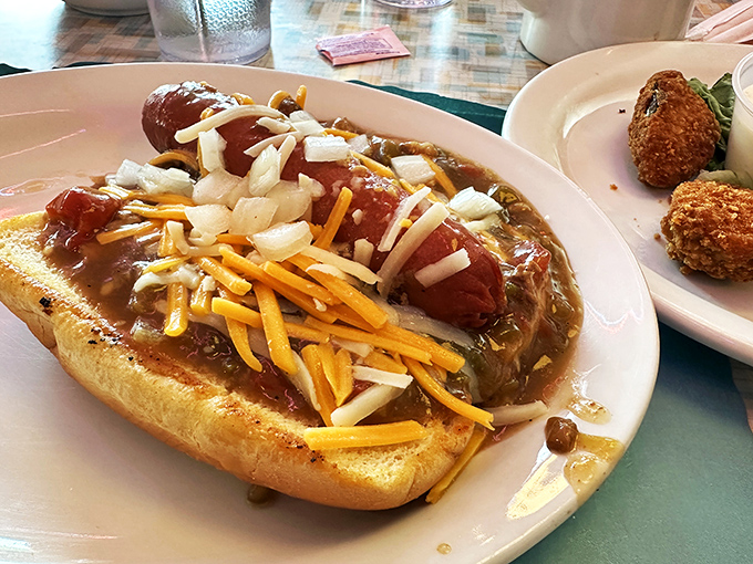 Hot diggity dog! This loaded beauty is like a flavor fiesta in a bun. Napkins required, but totally worth it.