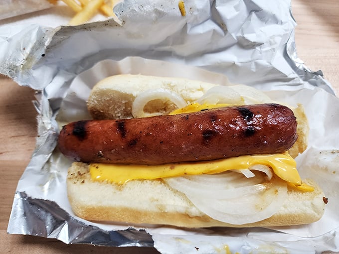 Hot diggity dog! This grilled beauty is ready for its close-up, and it's stealing the show from its bun co-star.