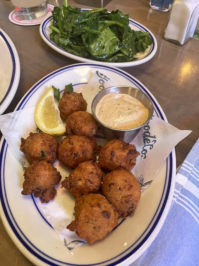 Hush puppies that bark with flavor. These golden orbs are the unsung heroes of Southern cuisine.