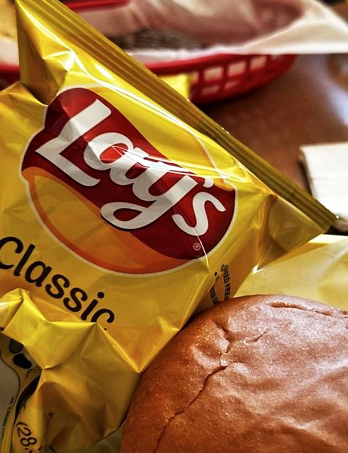 Chips: The unsung heroes of burger joints. These crispy companions are ready to catch any wayward toppings in their salty embrace.