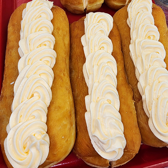 Long Johns with that perfect piping of cream&mdash;architectural marvels of the donut world. These aren't just pastries; they're edible art forms.