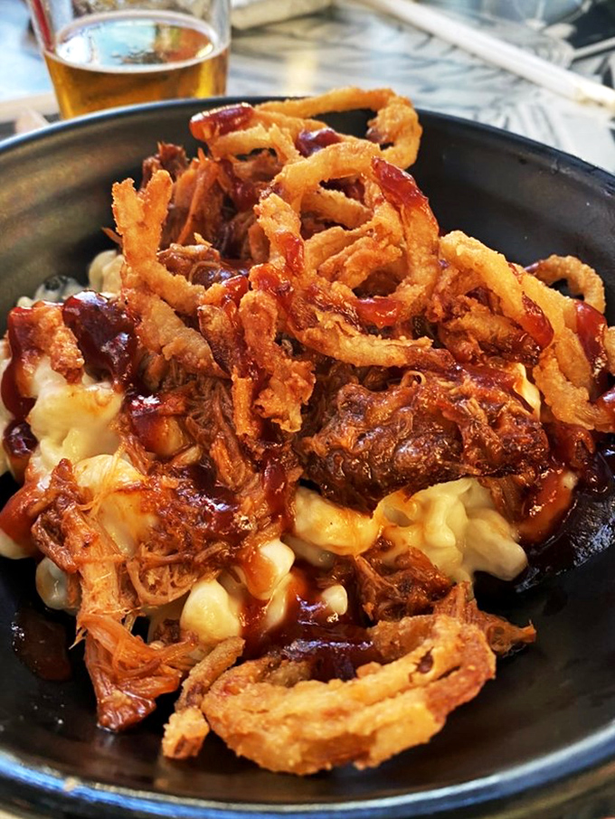 Mac and cheese that's been turbo-charged! This comfort food classic has been souped up with pulled pork and crispy onions.