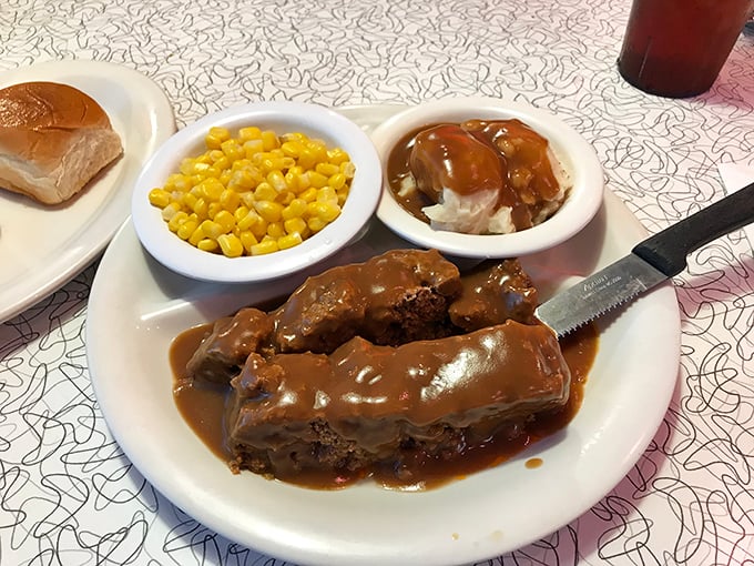 Grandma's secret recipe meets Paul Bunyan's appetite. This meatloaf could feed a lumberjack camp, smothered in gravy that's practically drinkable.
