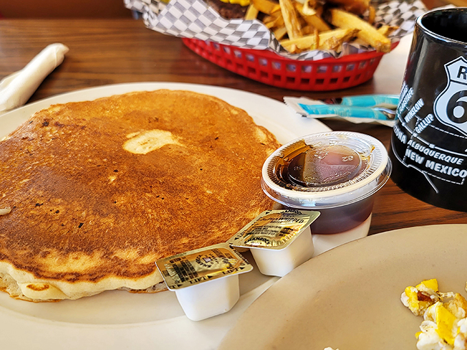 Pancakes the size of hubcaps! This flapjack is so big, it might need its own area code. Pass the syrup, and maybe a forklift!
