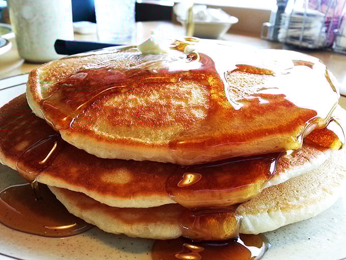 Stack attack! These pancakes are so perfectly golden and fluffy, they might just float right off your plate. Syrup waterfalls optional, but highly recommended.