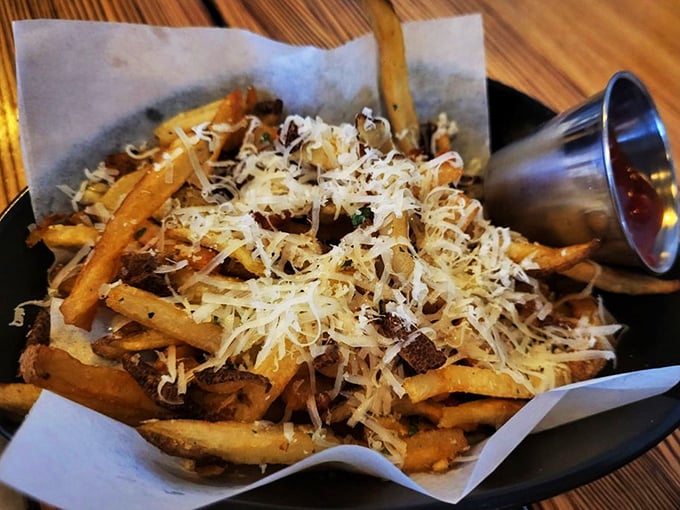 Fries aren't merely a side here but a spiritual experience &ndash; hand-cut potatoes showered with real Parmesan that puts airport "gourmet" versions to shame.