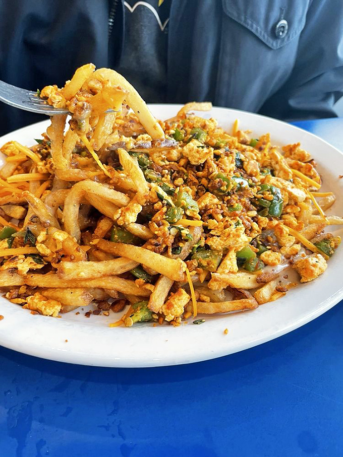 Poutine with a Southwestern twist? It's like Canada and Oklahoma had a delicious food baby. Your arteries might protest, but your soul will rejoice.