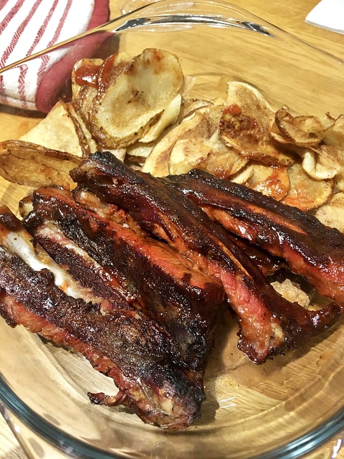 Forget farm-to-table, this is pit-to-plate perfection. These ribs are so good, you might forget table manners exist.