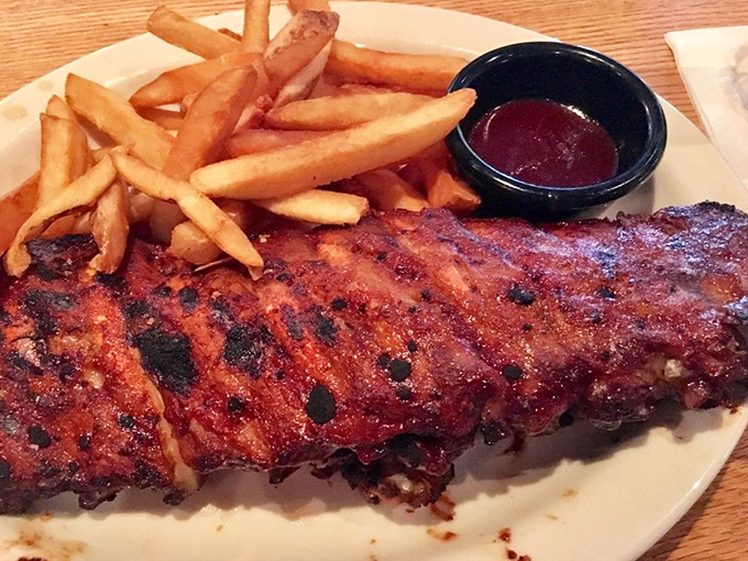 These ribs don't just fall off the bone &ndash; they practically leap onto your fork, their caramelized exterior glistening like a summer sunset.