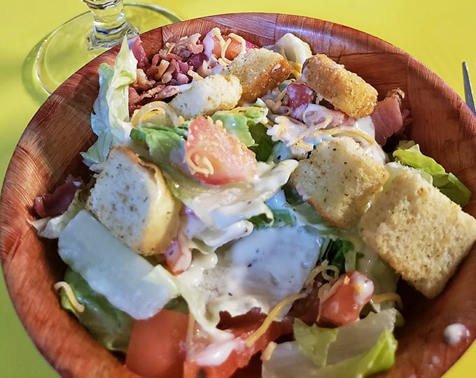 Who says you can't make friends with salad? This colorful bowl is like a party for your taste buds, with croutons as the VIP guests.