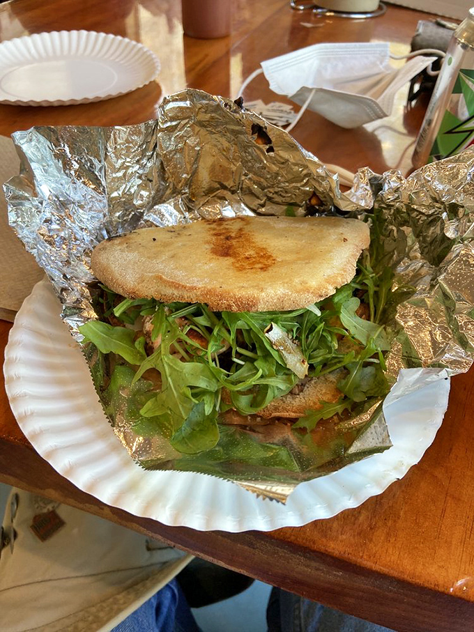 Who knew salmon could get this cozy? Nestled between layers of crispy, toasty goodness, it's the catch of the day you'll want to reel in.