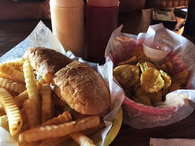 Who says seafood joints can't do sandwiches? This hearty handful proves that land and sea can coexist deliciously on a bun.