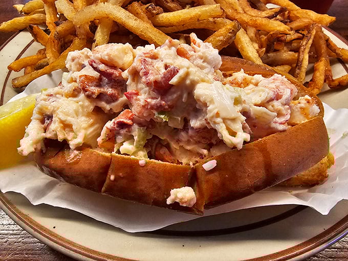 This sandwich is stacked higher than a Jenga tower in an earthquake zone. One bite, and you'll be shouting "Winner, winner, lobster dinner!"