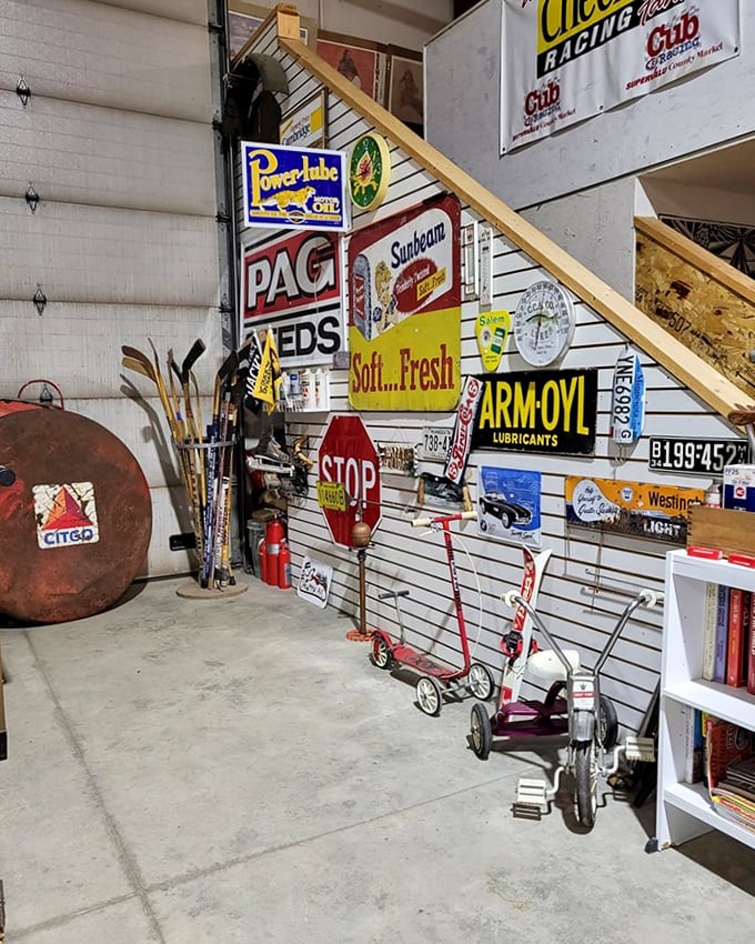 A wall of nostalgia that screams "I brake for yard sales!" These vintage signs are like a roadmap of America's advertising history.