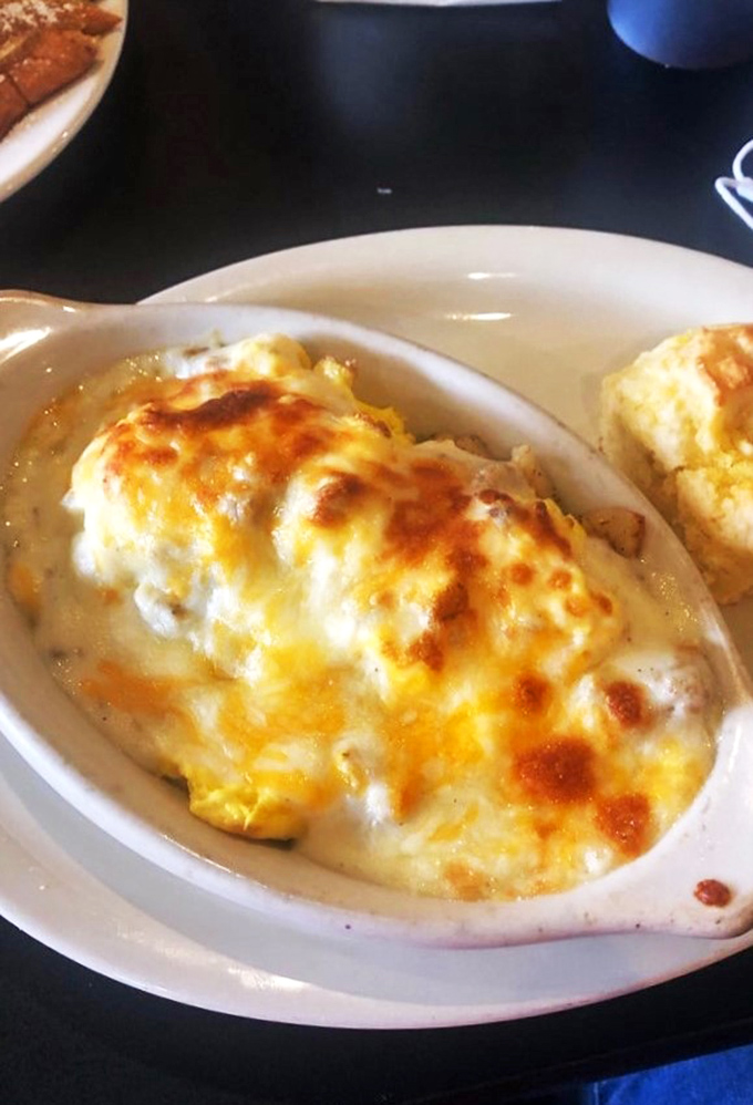 Behold, the breakfast of kings! This cheesy, gooey skillet is like a warm hug for your stomach. It's so good, you might shed a tear of joy.