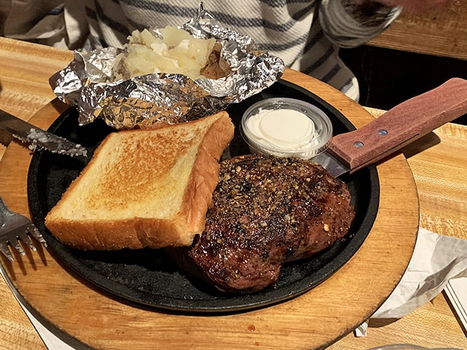 Steak your claim! This perfectly grilled piece of beef is so juicy, you might need a lifejacket to navigate through its flavorful depths.