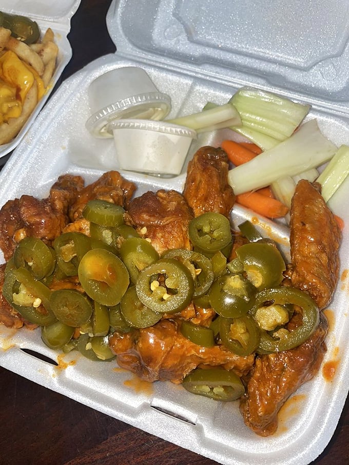 Caution: Flavor explosion ahead! These suicide wings are so hot, they come with their own waiver and tiny fire extinguisher.