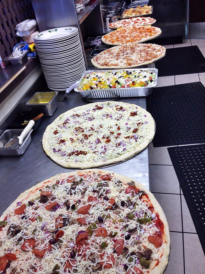 Pizza lineup looking finer than the Rockettes. Each pie vying for the spotlight, but they're all stars in my book.