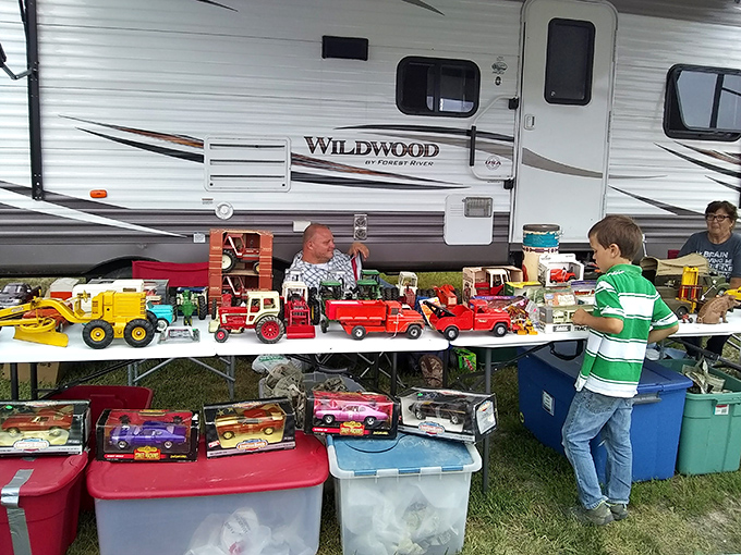 Toy story come to life! This vendor's playground of nostalgia features enough classic trucks to start a pint-sized construction company.