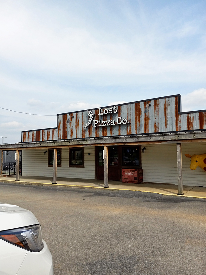 Lost Pizza Co: X marks the spot for great pizza! This weathered exterior looks like it was assembled from a shipwrecked pirate vessel.