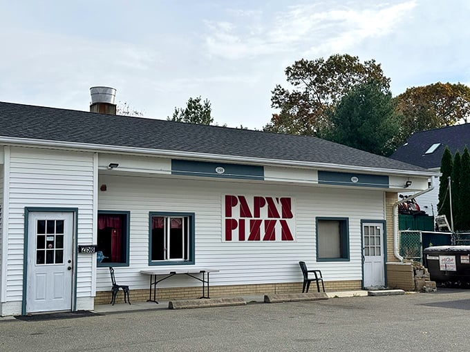 Papa's Pizza: Don't judge a pizzeria by its siding! Behind that simple exterior lies a world of thin-crust wonders.