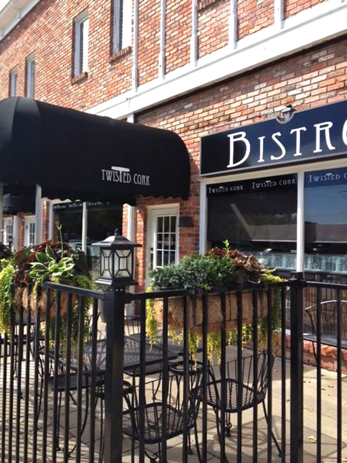 Twisted Cork Bistro: Where cozy meets coastal! This charming brick facade hides a sea of culinary surprises.