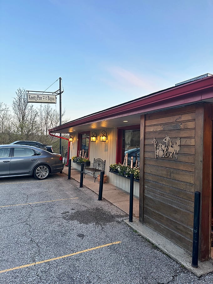 Rustic charm meets bayou flavors at Knotty Pine. This unassuming exterior hides a world of spicy, savory delights!