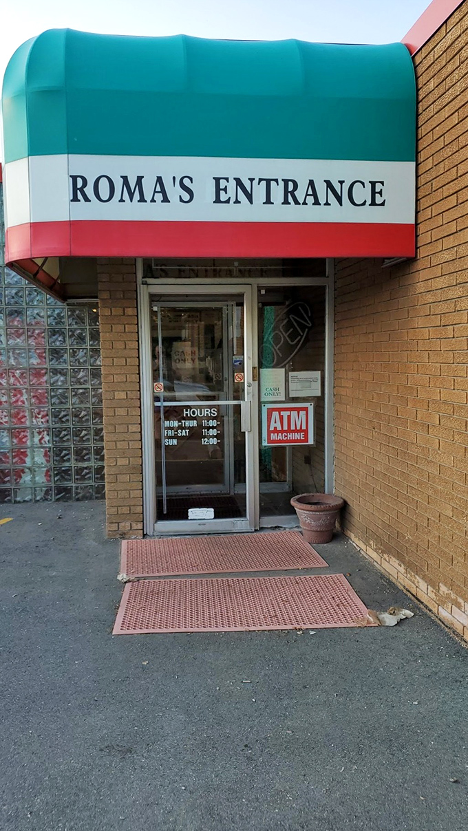 Roma's tricolor awning isn't just decor; it's a promise of authentic flavors. Inside, every pizza tells a story of tradition, family, and mouthwatering deliciousness.