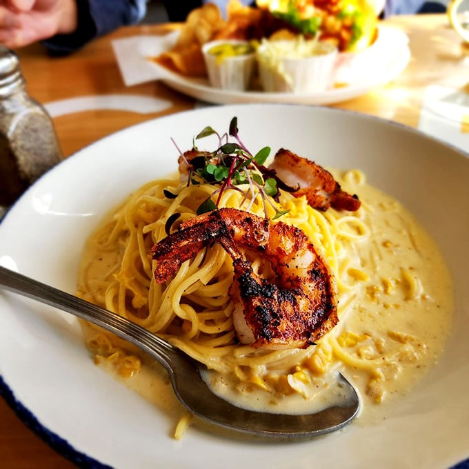 Blackened shrimp doing the tango with creamy alfredo &ndash; it's a pasta dish that's dressed to impress!