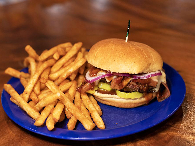 This isn't just a burger&mdash;it's architecture. The perfect stack of beef, pickle, onion and bun, with fries that look like they're auditioning for a food commercial.