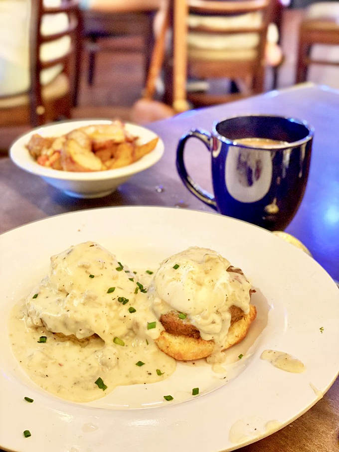 Country Benedict: Where biscuits meet their eggy soulmate. It's a match made in breakfast heaven, smothered in gravy-licious bliss.