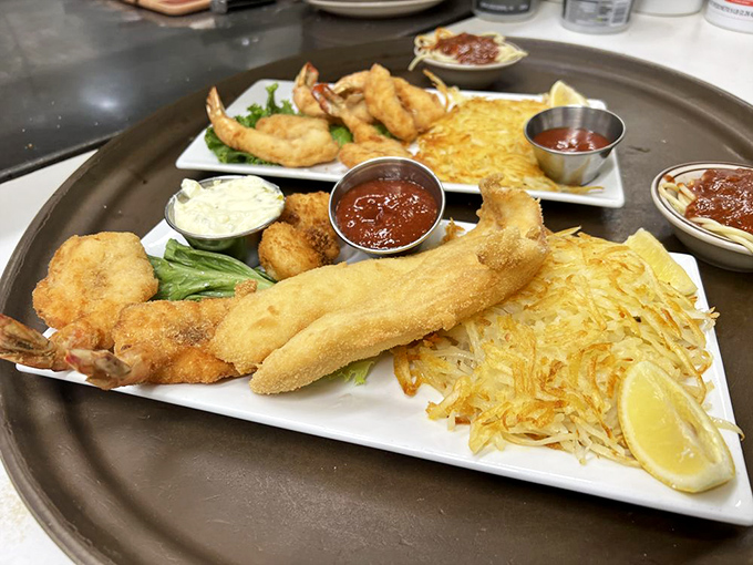 Seafood that would make coastal restaurants jealous, served with hash browns so crispy they deserve their own fan club.