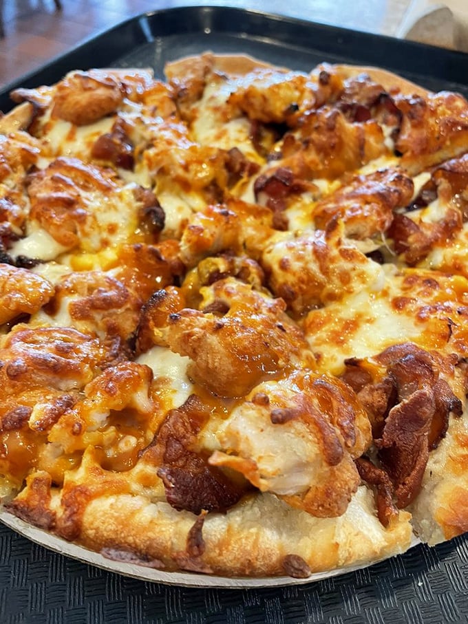 Golden nuggets of joy! This pizza is proof that chicken nuggets can grow up to be anything they want, even gourmet pizza toppings.
