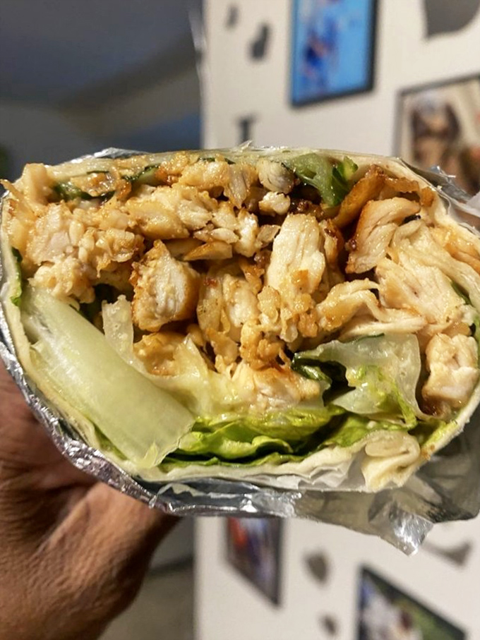 Wrapped up tighter than a burrito at a yoga class, this grilled chicken wrap is a handheld flavor explosion waiting to happen.