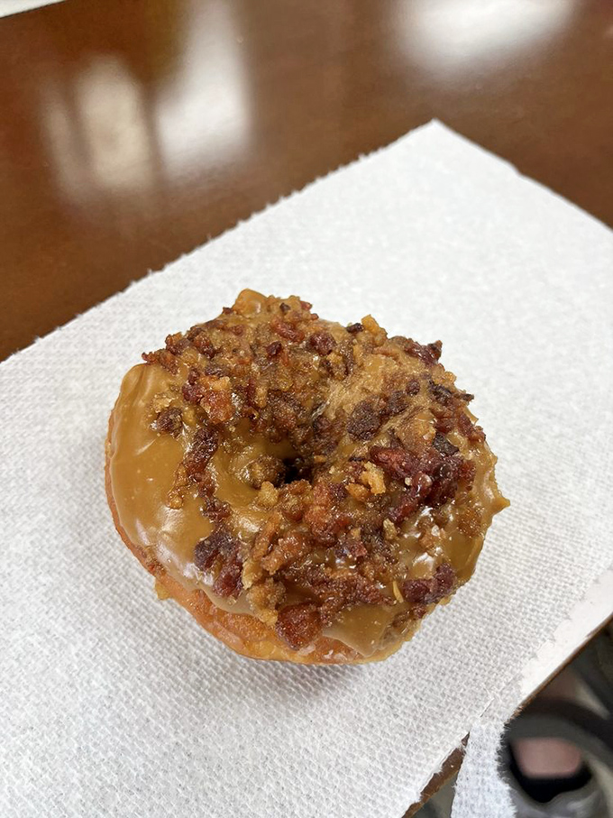 Holy sweet and savory, Batman! This maple bacon donut is the superhero your breakfast needs, cape and all.