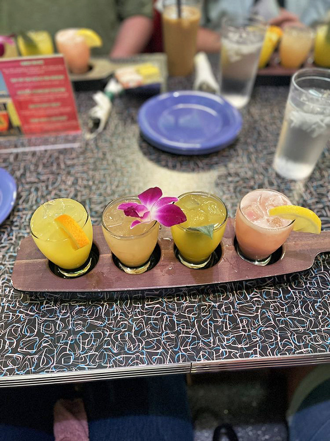 Liquid sunshine in four acts! This mimosa flight is a boozy rainbow that'll brighten any brunch.