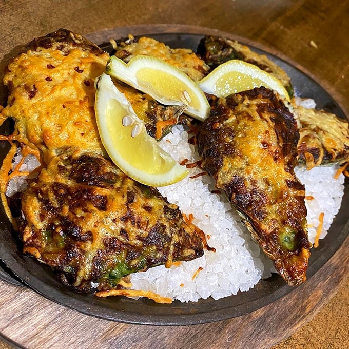 Oysters Rockefeller: The dish so rich, it makes Wall Street bankers look like penny-pinchers. A decadent delight for the seafood connoisseur.