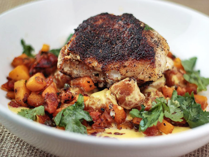 This pan-seared sea bass is so perfectly cooked, it might just swim off your plate. Quick, catch it with your fork!