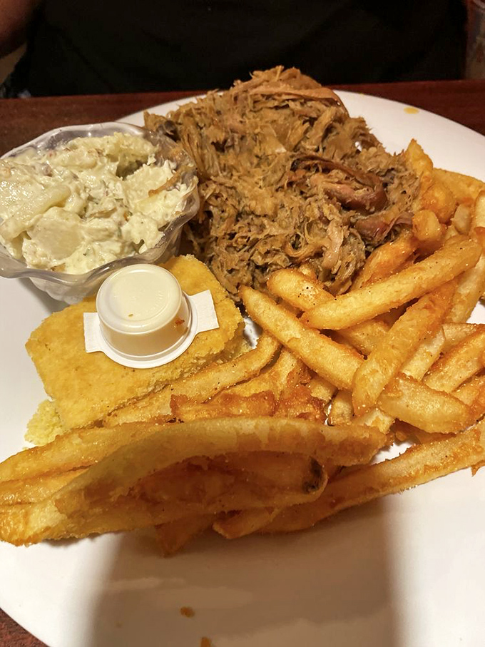 Pulled pork that looks like it's been combed by angels, paired with green beans that actually make vegetables exciting again.