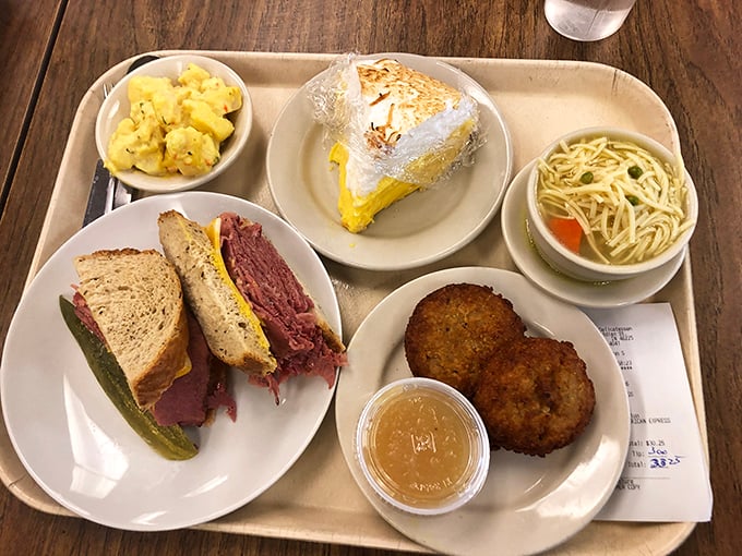 Rye bread: the unsung hero of the sandwich world. Here, it cradles a mountain of meat like a carb-loaded superhero.