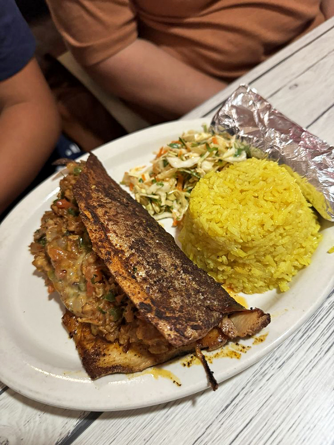 This stuffed trout is living its best life, nestled on a bed of vibrant slaw. Talk about going out in style!