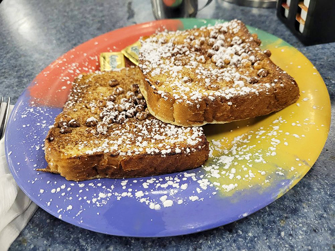 French toast so golden, it belongs in Fort Knox. Crispy edges, custardy center &ndash; it's the breakfast of champions.