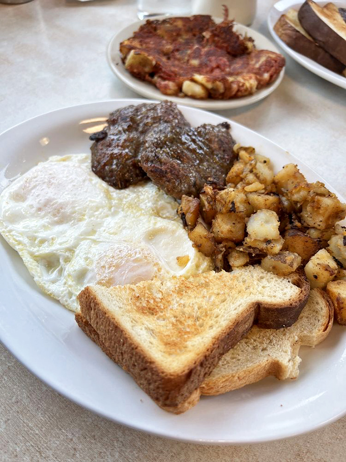 Rise and shine! This plate's got more protein than a bodybuilder's smoothie. Fuel up for your day of Vermont adventures!