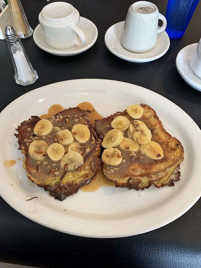 Banana French toast that's more indulgent than a shopping spree on the Champs-&Eacute;lys&eacute;es. It's not breakfast; it's dessert in disguise.