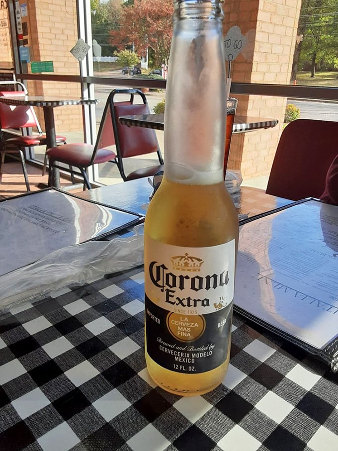 Nothing says "pizza party" like an ice-cold Corona. It's the beach vacation your taste buds didn't know they needed.