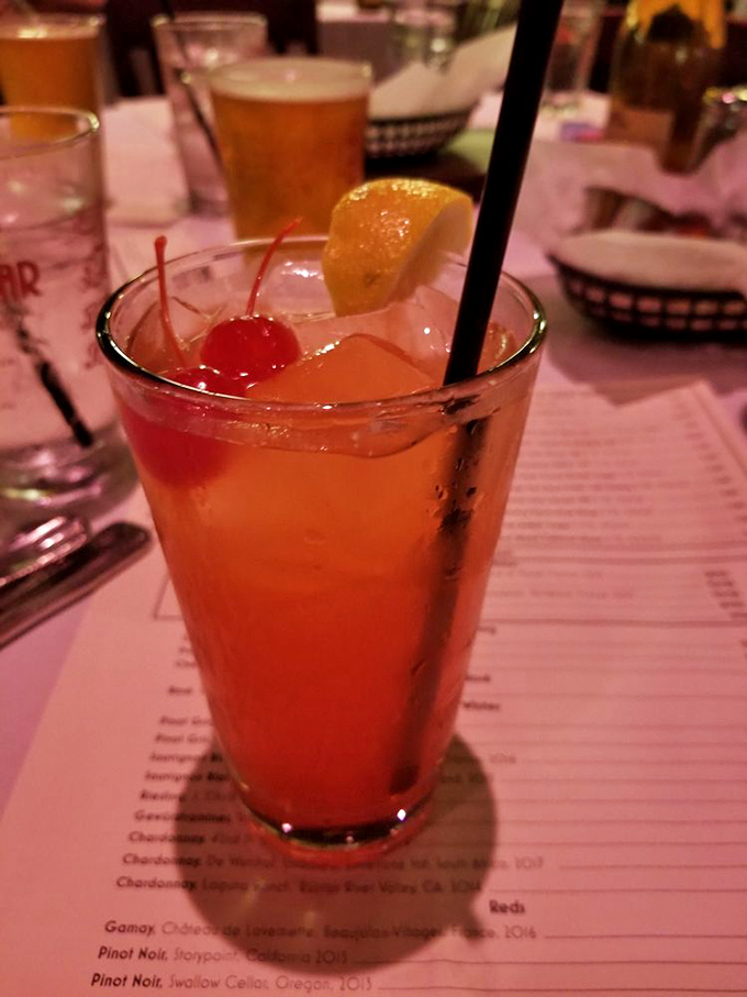 Cheers to good times! This cocktail is dressed to impress, like a tiny, delicious sunset in a glass.