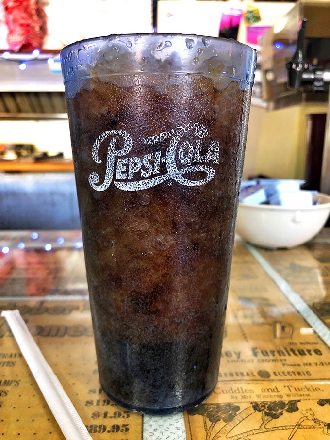 That vintage Pepsi glass isn't just holding soda&mdash;it's holding memories of a time when fountain drinks came with unlimited refills and actual conversation.