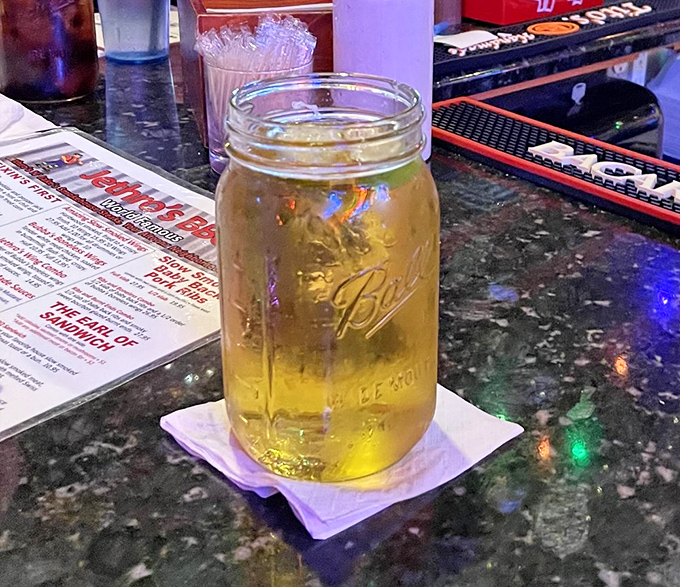 Liquid gold in a mason jar! This refreshing beverage is the perfect sidekick for your barbecue adventure. It's like sunshine in a glass.