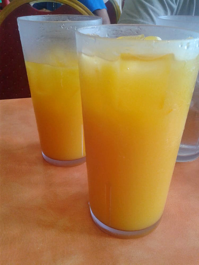 These glasses of sunshine aren't just drinks, they're liquid vitamins with a side of tropical vacation vibes.